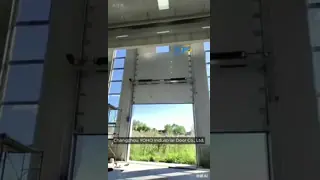 0.3 - 0.6mm color-coated steel industrial sectional overhead door for logistics transit warehouses