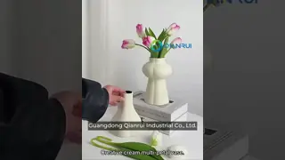 sculptural ceramic vase in soft cream finish