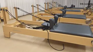 professional grade wood reformer pilates bed crafted from wood suitable for commercial studios